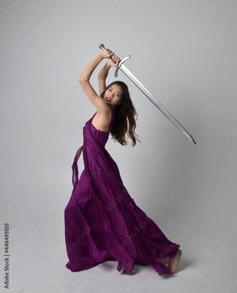 Full length portrait of pretty brunette asian girl wearing purple ...