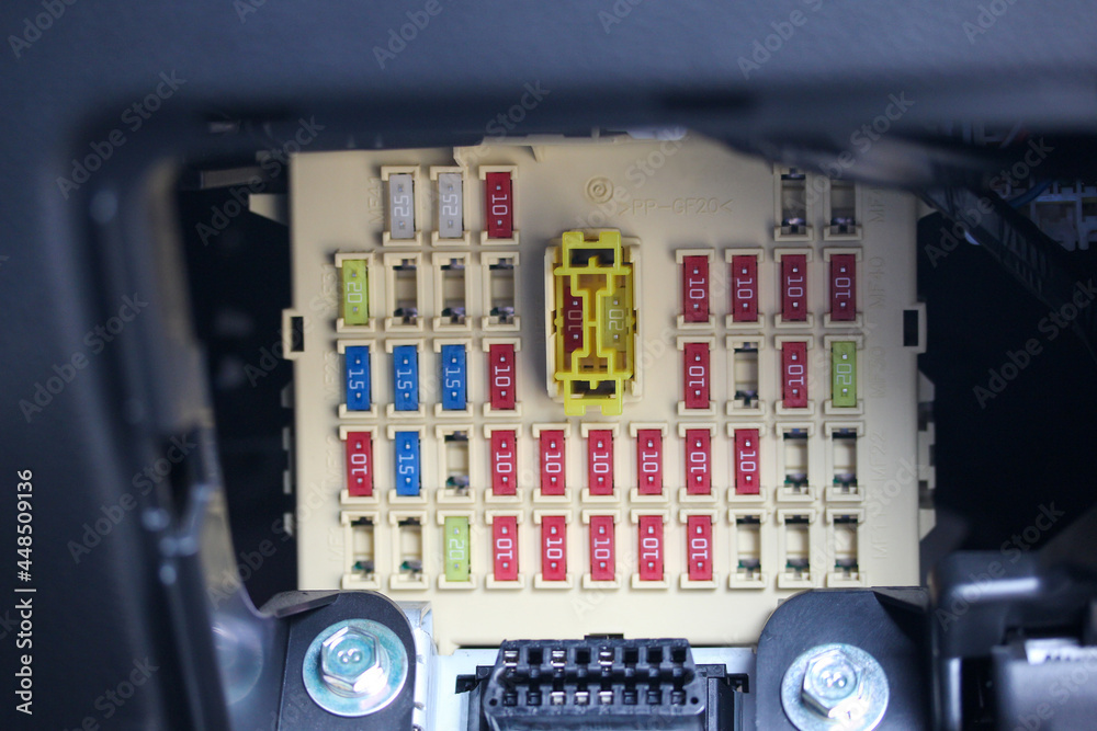 Fuse box in a modern vehicle with many different color fuses Stock ...