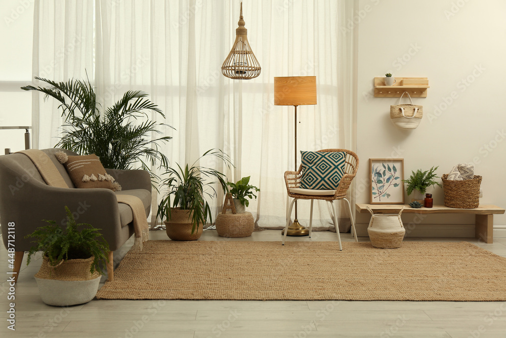 Light living room with boho decor. Interior design Stock Photo | Adobe ...