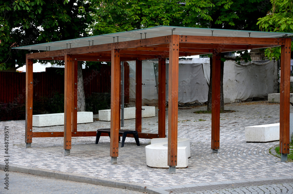 wooden structure of the bus stop, the shelter of the gazebo pergola ...