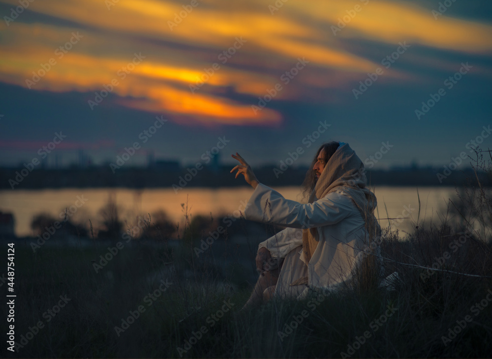 Jesus Christ preaching Christian faith conversion against river and ...