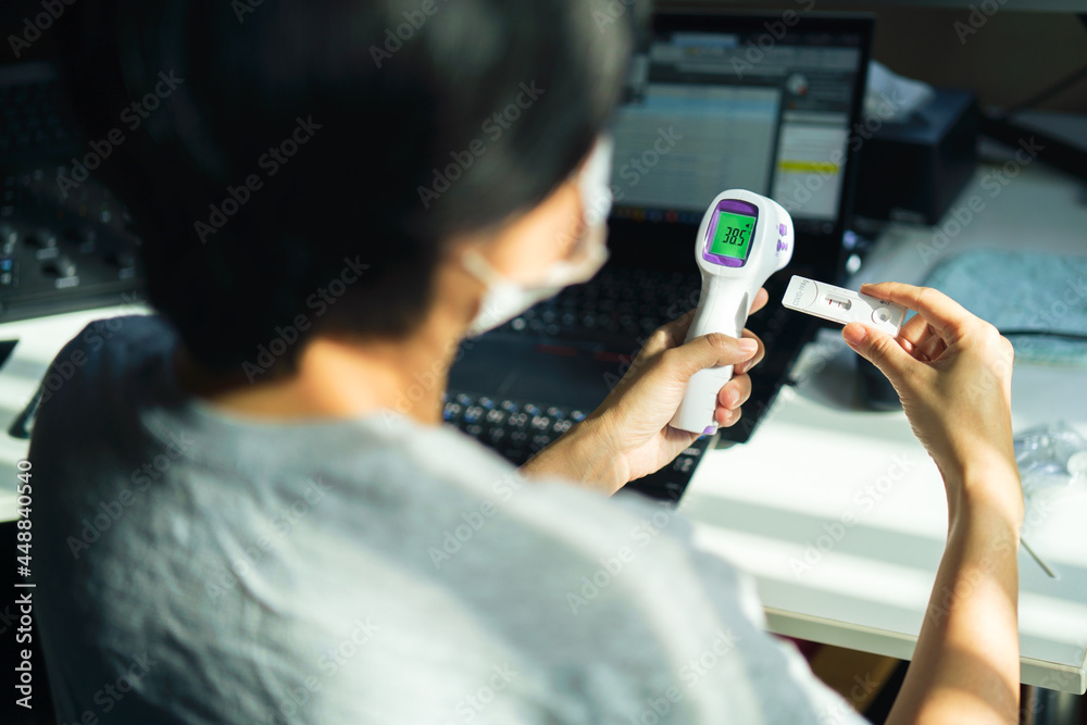 Self check at home when have fever symptom, People holding infrared ...