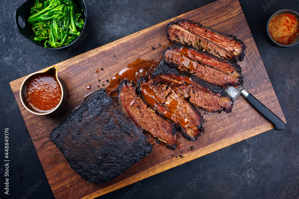 Modern style traditional smoked barbecue wagyu beef brisket with baby ...