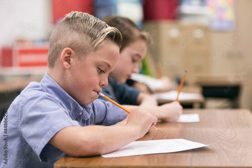 Classroom: Young Student Thinking About Classwork Stock Photo | Adobe Stock