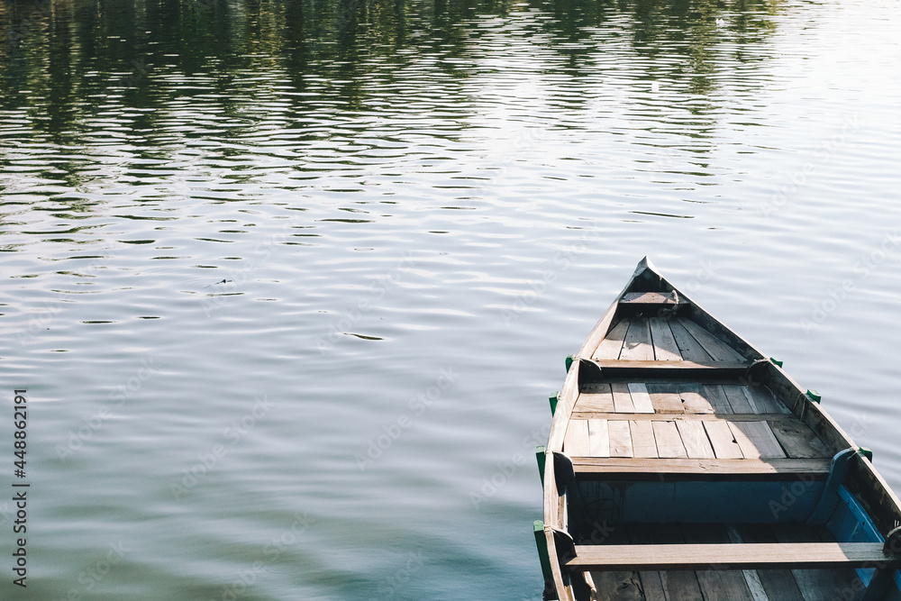 Reflection in the water of boats over nature background Stock Photo ...