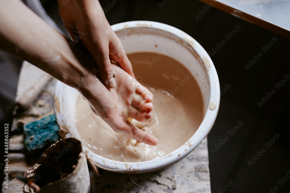 Crafter washing palms after workflow Stock Photo | Adobe Stock