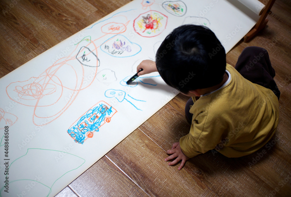 Cute Asian Chinese little boy drawing at home Stock Photo | Adobe Stock
