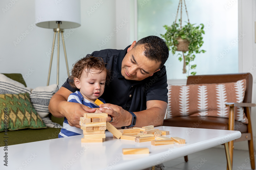 Father Shows Son how to Stack Blocks Stock Photo | Adobe Stock