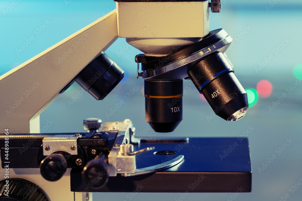 Microscope and model of chemical molecule in school class Stock Photo ...