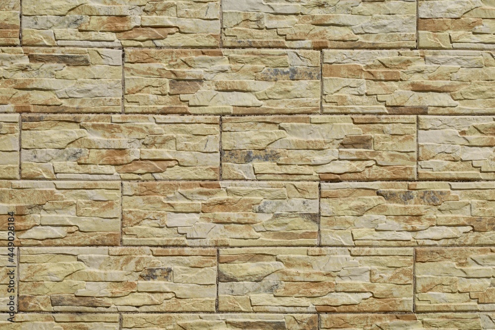 Stoneware cladding wall with stone effect. Colors are flaxen yellow ...