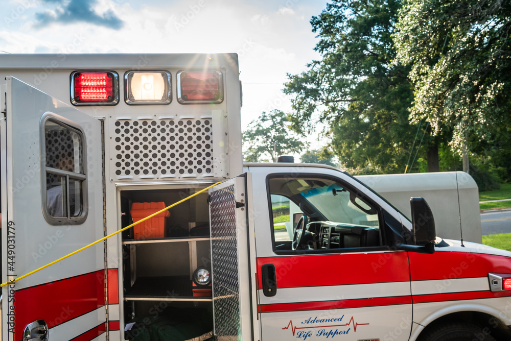 Side view of EMS ambulance truck with open door Stock Photo | Adobe Stock