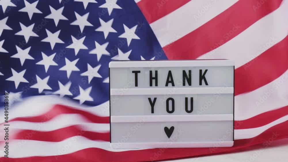 Slow motion Waving American Flag Background Lightbox with text THANK ...