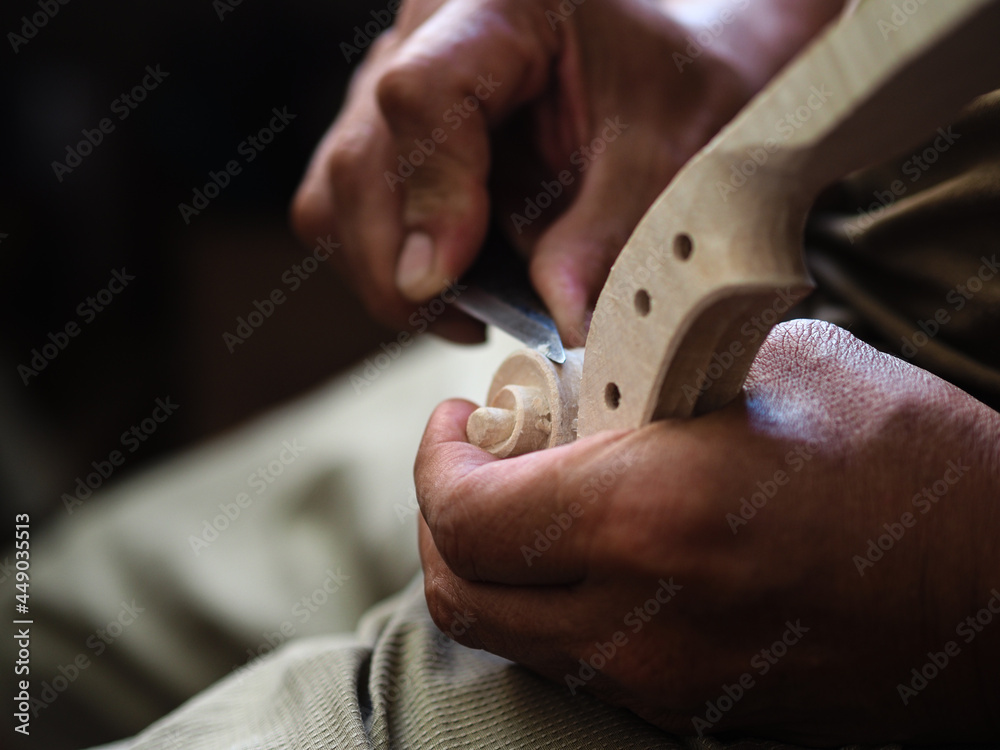 Luthier violinmaker scultping a classic violin curl Stock Photo | Adobe ...
