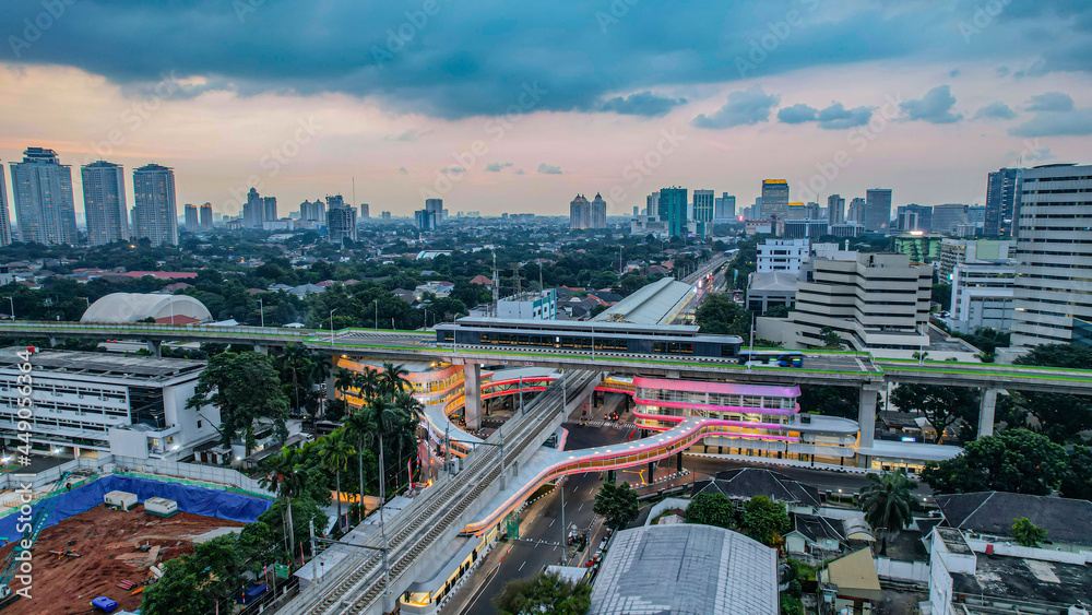 Aerial view of articulated city buses arriving and leaving at bus ...