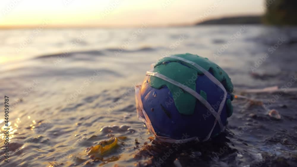 dirty earth model in water, earth pollution concept, wasted earth ...