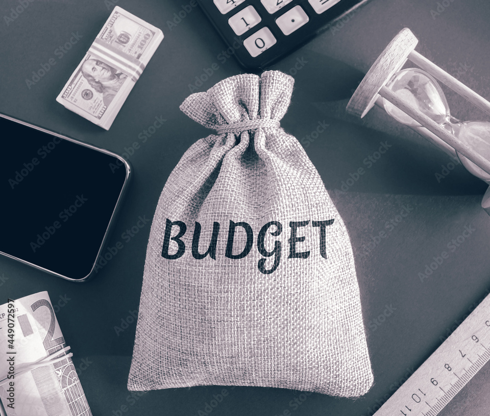 Money bag with the word Budget. Budgeting, forecasting income and ...