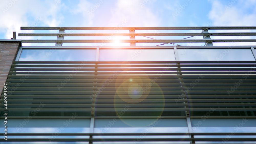 Futuristic facade of a modern office building clad in glass. Glass ...