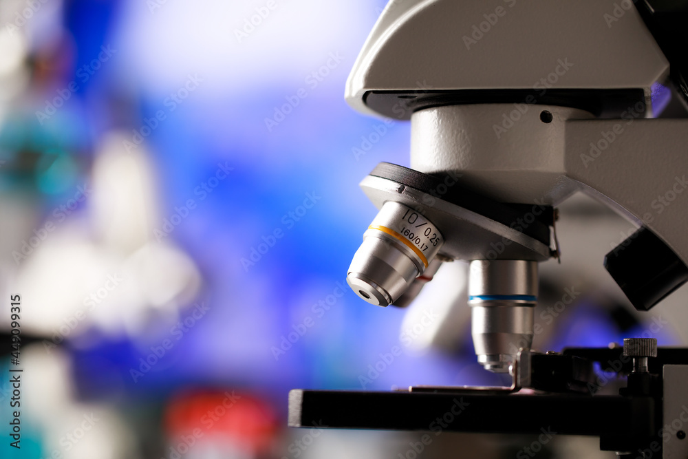 Closeup shot of microscope with selective lens objectives for various ...