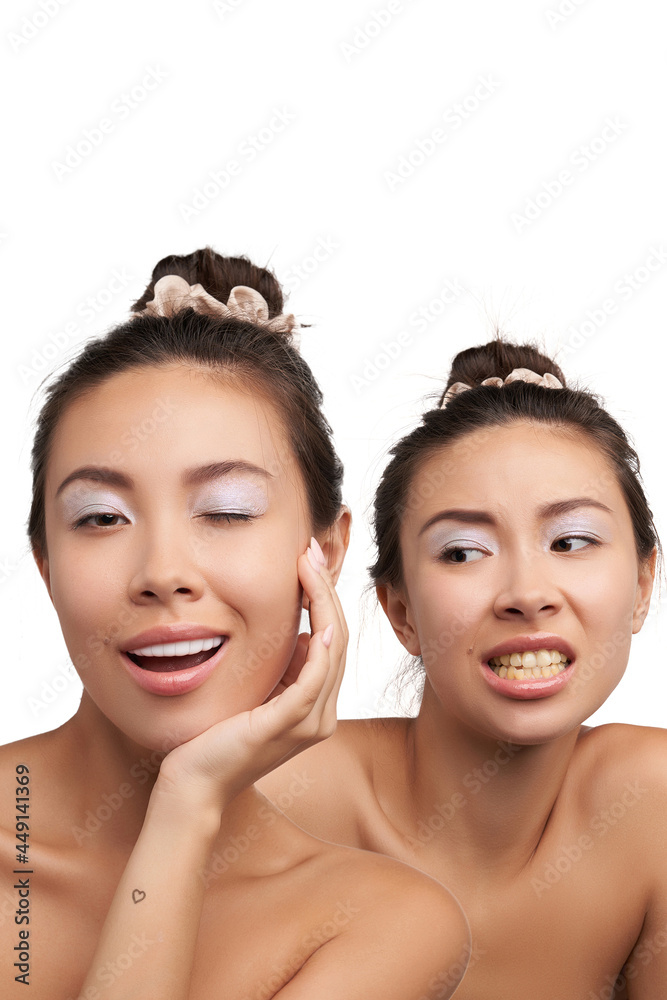 Young pretty lady is smiling and showing difference between natural ...