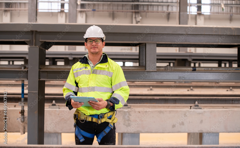 Engineer under inspection and checking construction process railway ...