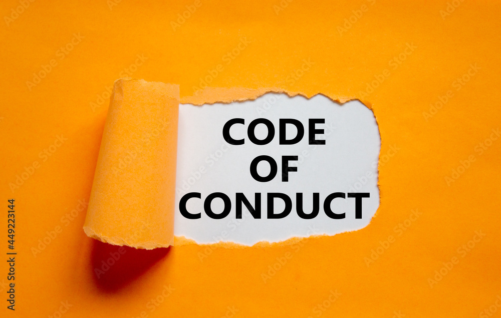 Code of conduct symbol. Words 'Code of conduct' appearing behind torn ...