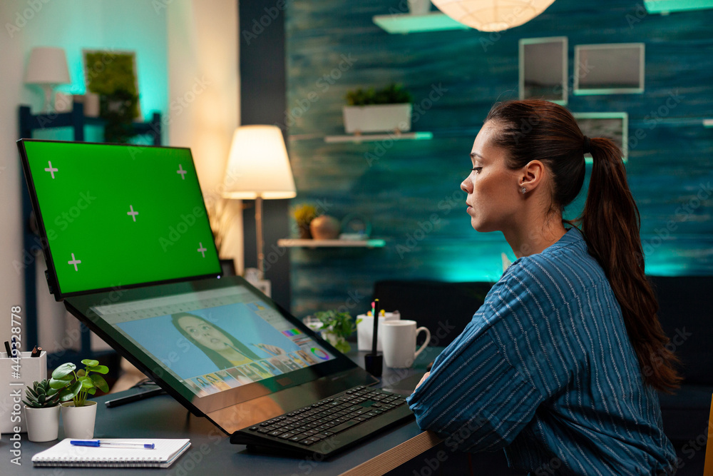 Studio editor worker looking at green screen on monitor and editing ...