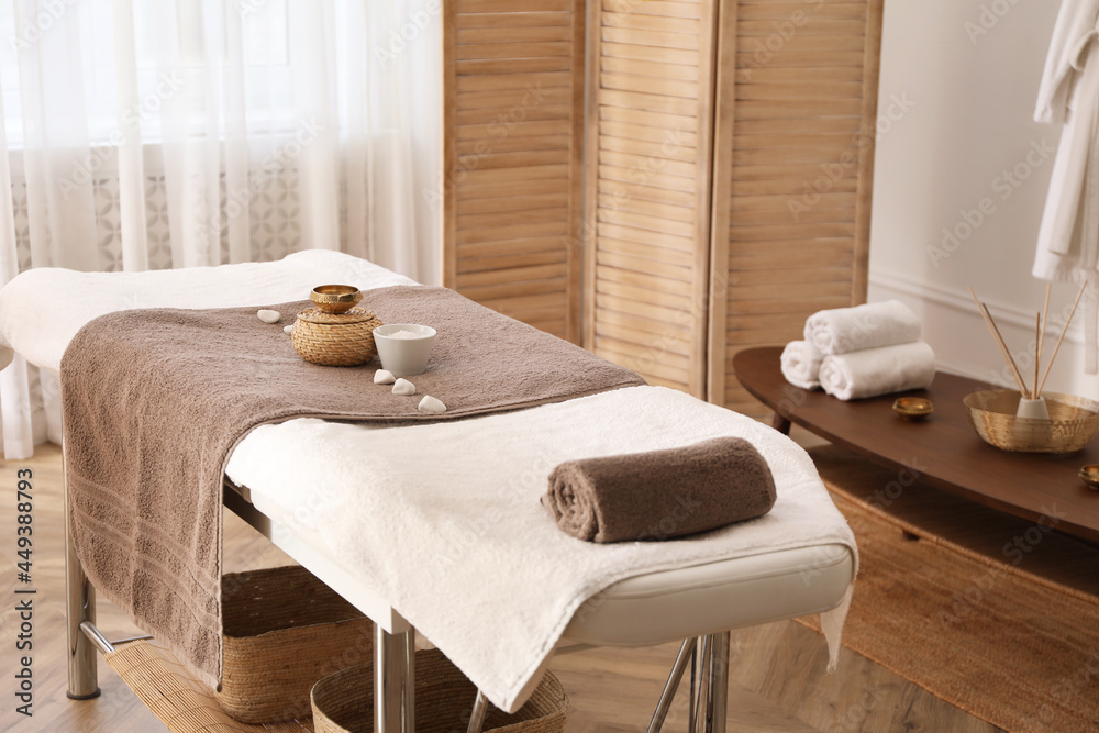 Stylish room interior with massage table in spa salon Stock Photo ...