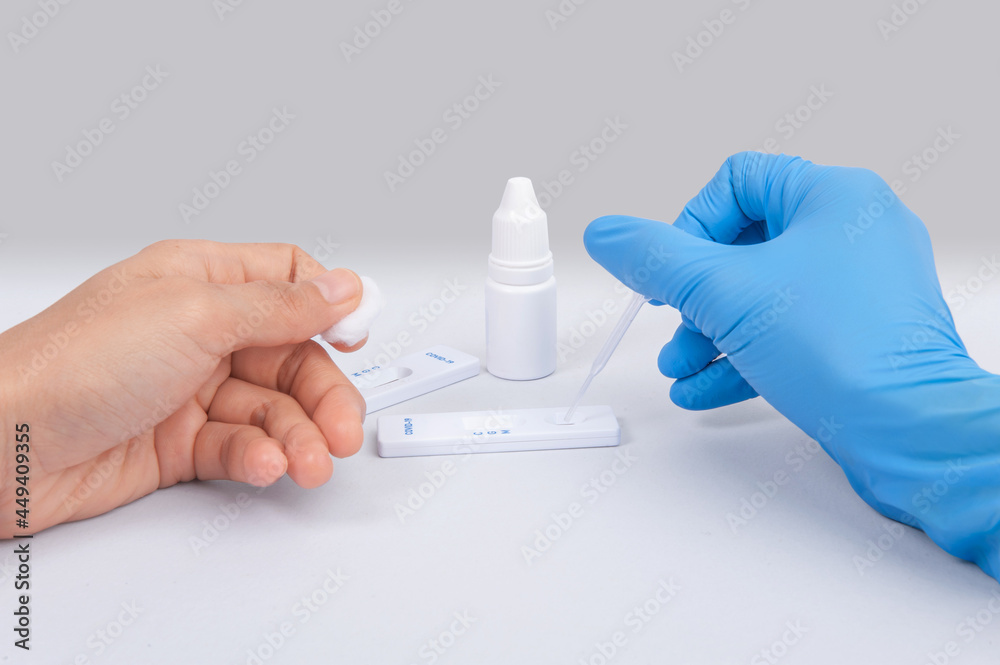 Doctor hand making a test kit for viral disease COVID-19 nCoV for ...