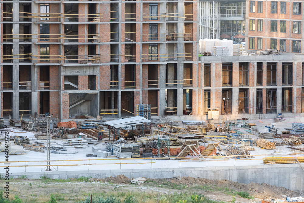 Construction site. Scaffolding. Building frame. Exterior of unfinished ...