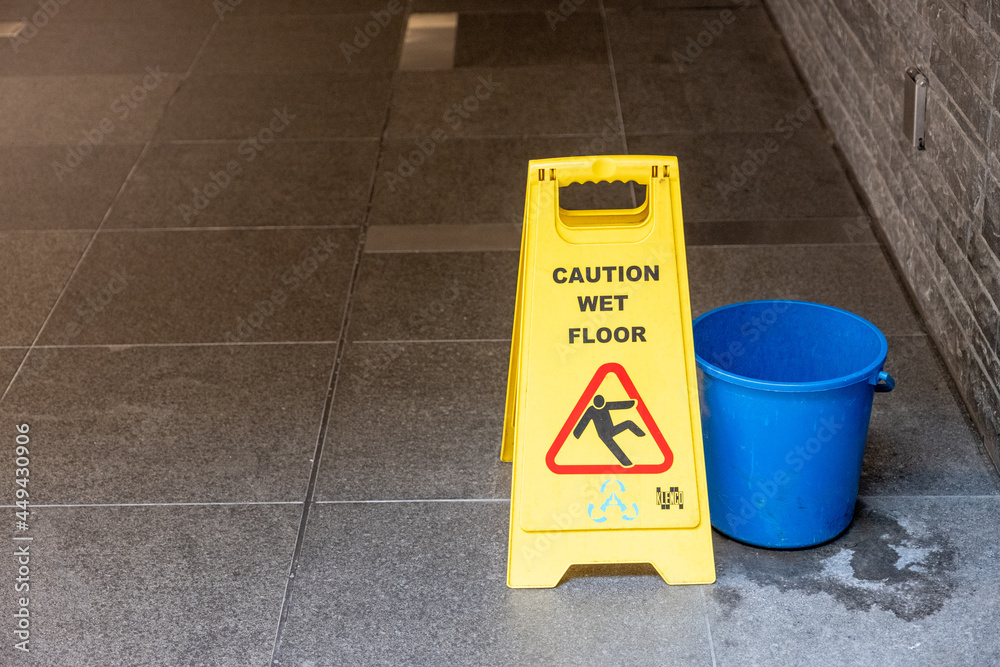 caution wet floor sign Stock Photo | Adobe Stock