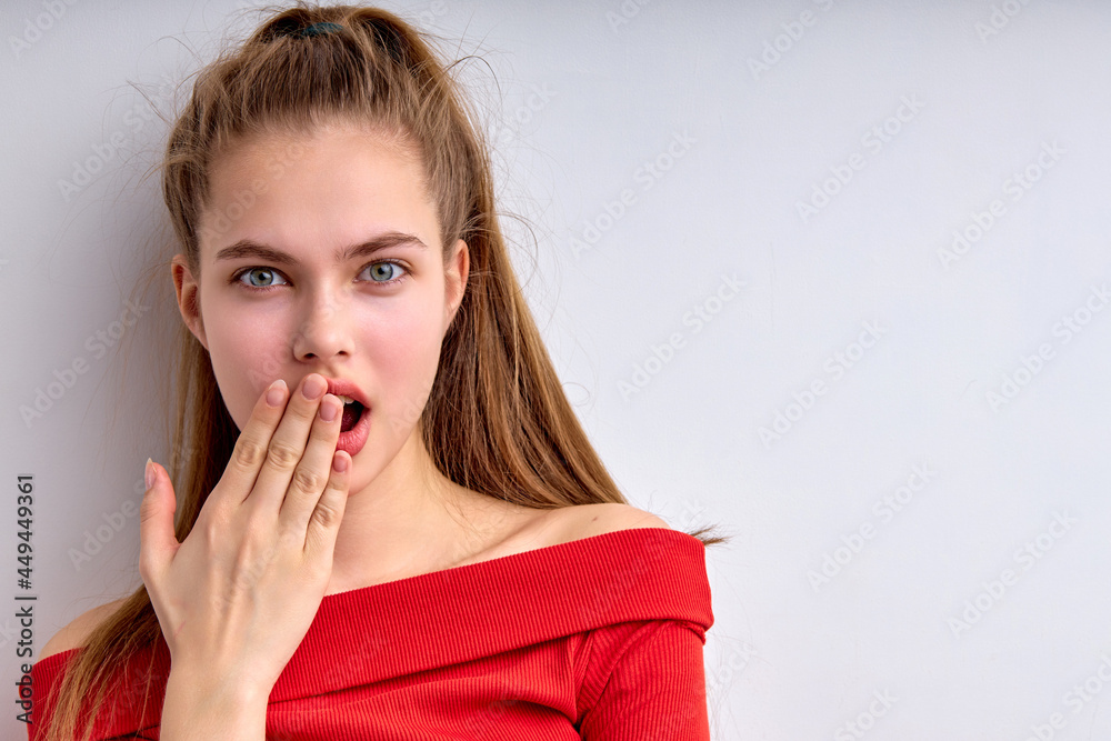 shocked Caucasian female opens mouth widely from surprisement, feels ...