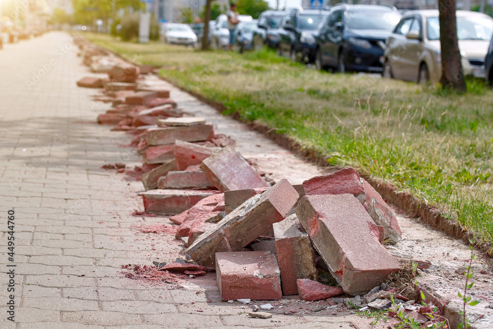 Road work, curb replacement, urban landscape edging. Broken sidewalk ...