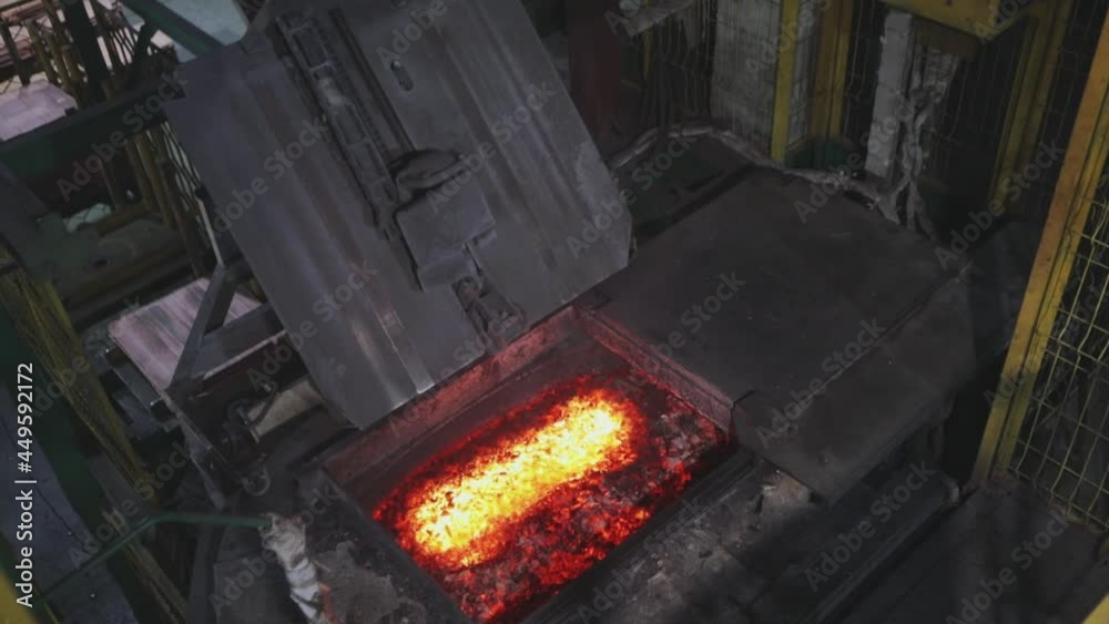 Metal melting in a furnace, red-hot metal. The furnace with molten ...