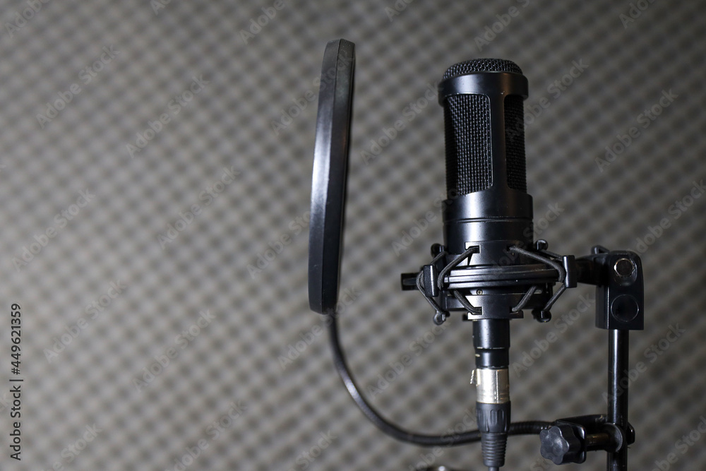 Recording microphone high res with studio wallpaper background Stock ...