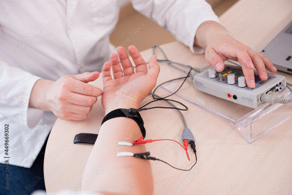 Patient nerves testing using electromyography at medical center Stock ...