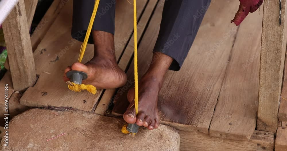 Kente cloth weaver foot rope for loom Kumasi Ghana. A town in Ghana ...