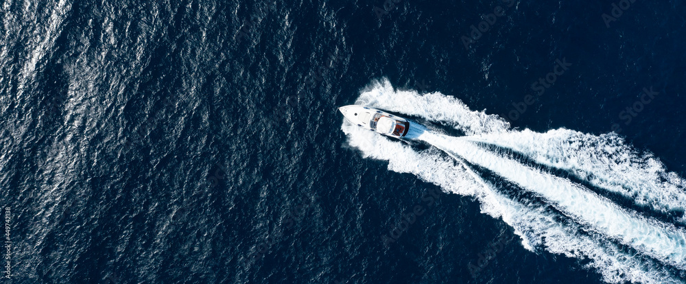 View from above, stunning aerial view of a luxury yacht cruising on a ...