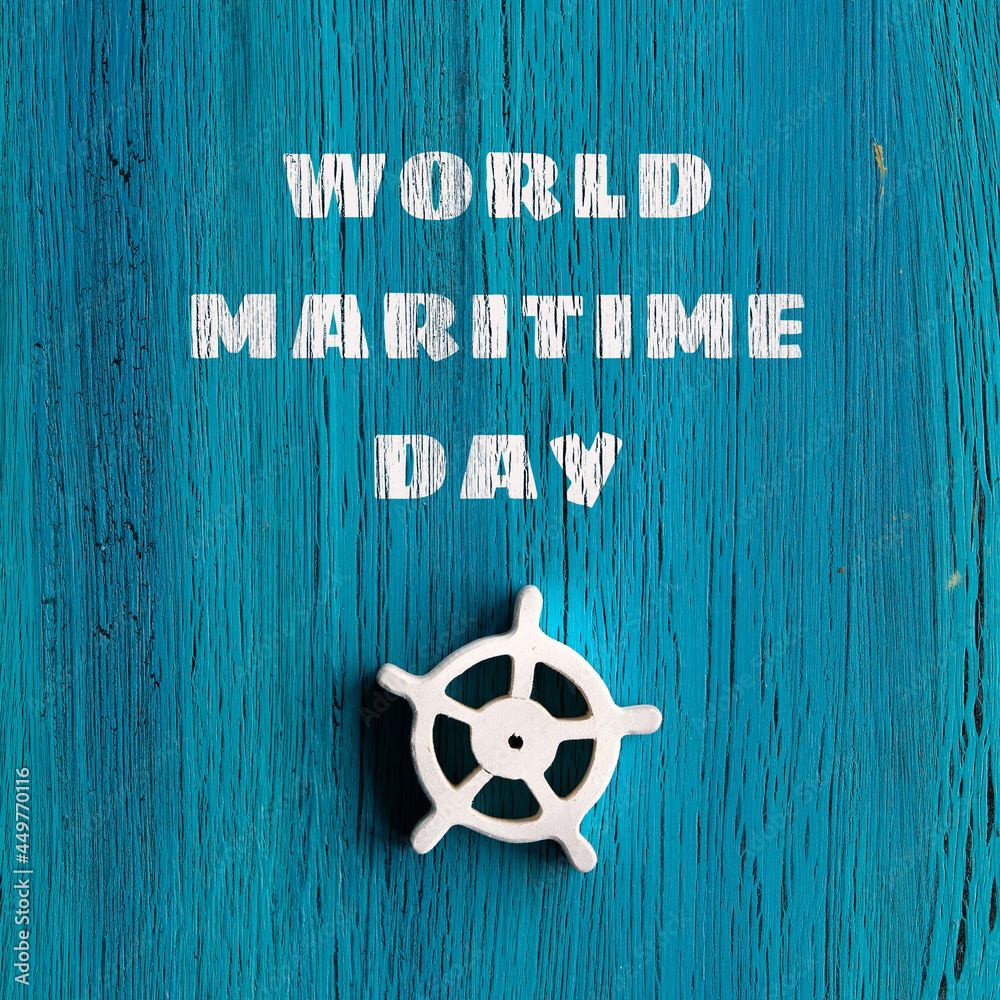 World Maritime Day text on grungy blue turquoise wooden background ...