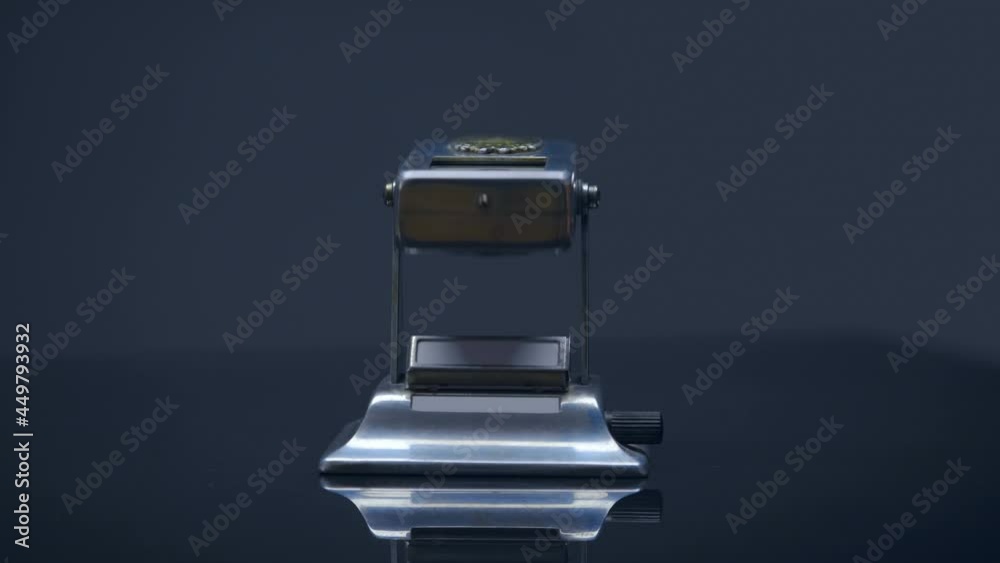 Old-fashioned metal shiny flip calendar rotates and the dates change ...