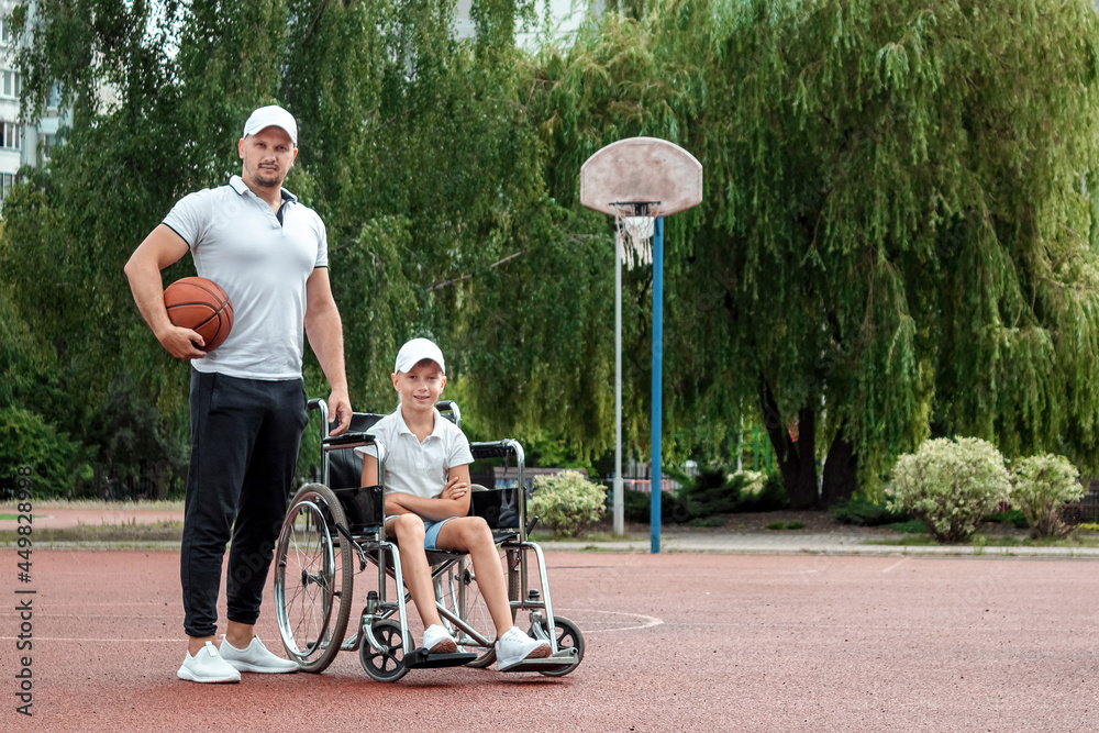 Wheelchair concept, disabled child, father and son, full life ...
