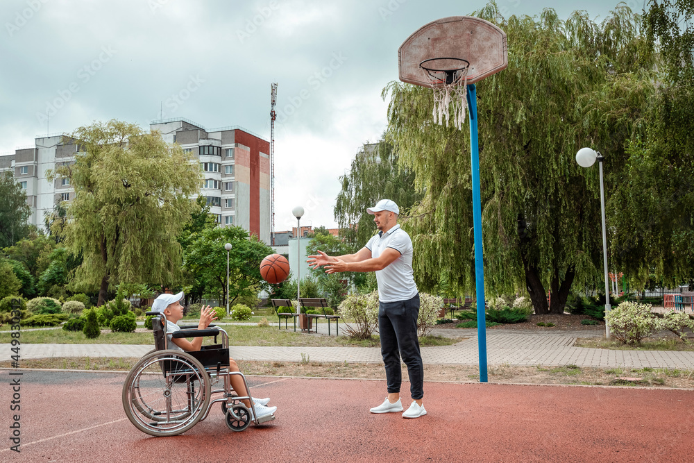 Wheelchair concept, disabled child, father and son, full life ...