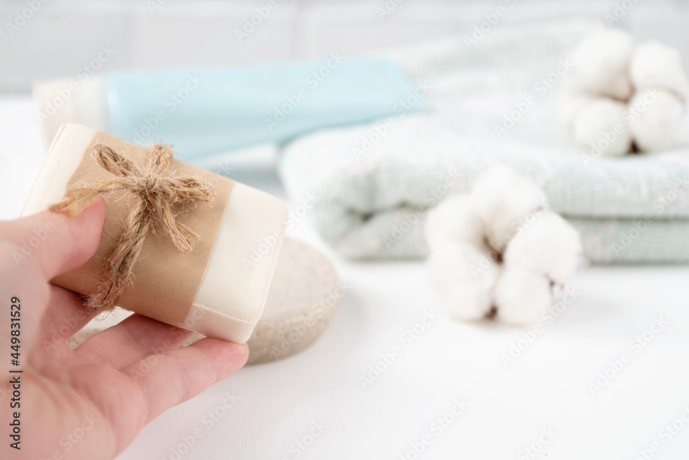Woman's hand puts new bar of soap on tray in the bathroom. Stock Photo ...