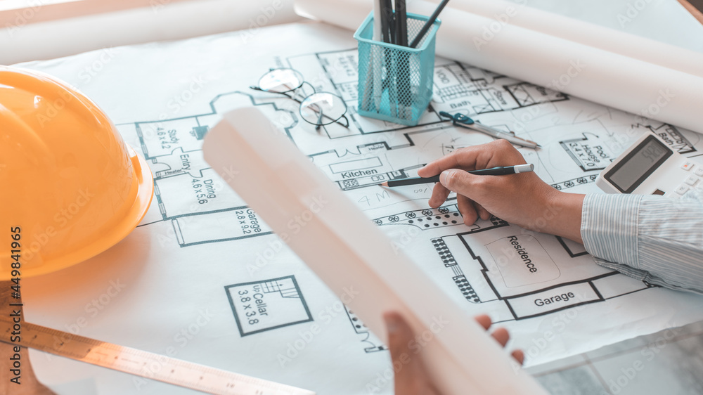 Architectural building design and construction plans with blueprints ...