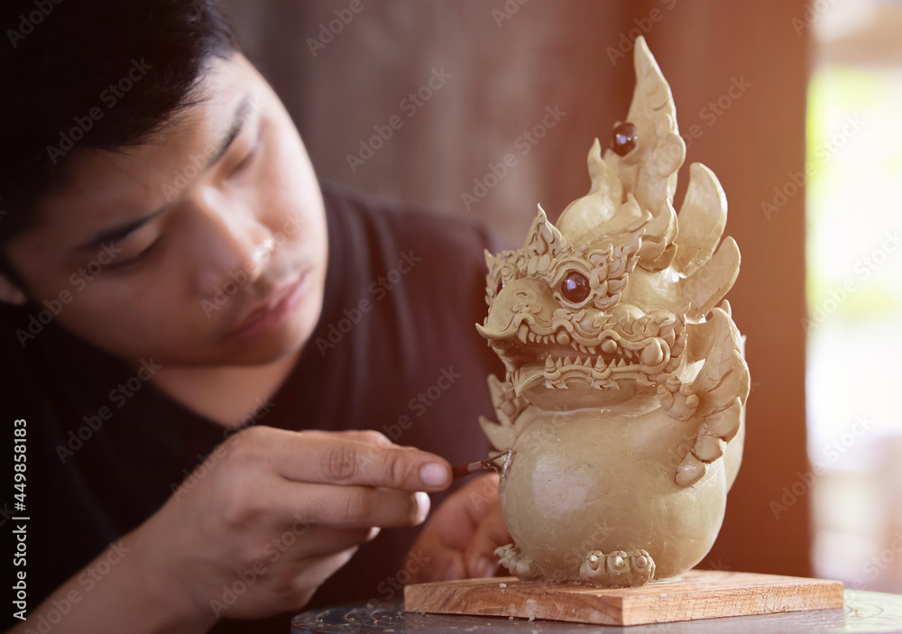 Artist creates a sculpture made of wax. by using specific sculptural ...