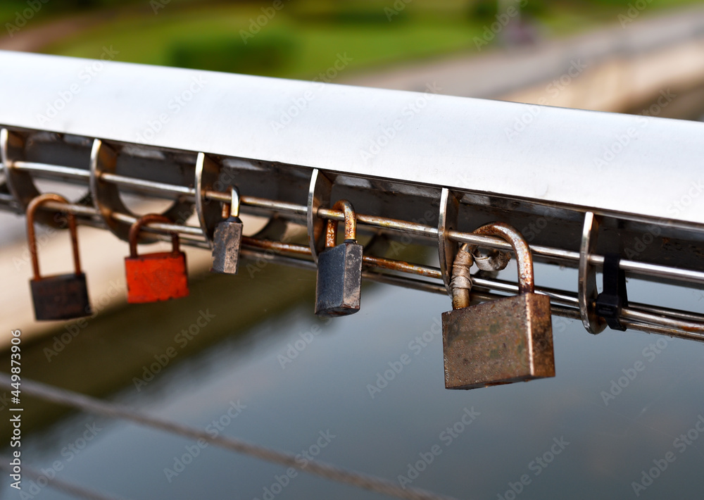 Padlock on Lovers Lock Bridge. Husband and wife during the wedding hung ...