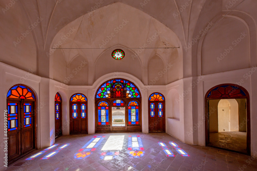 Room with stained glass windows in the traditional historic Iranian ...