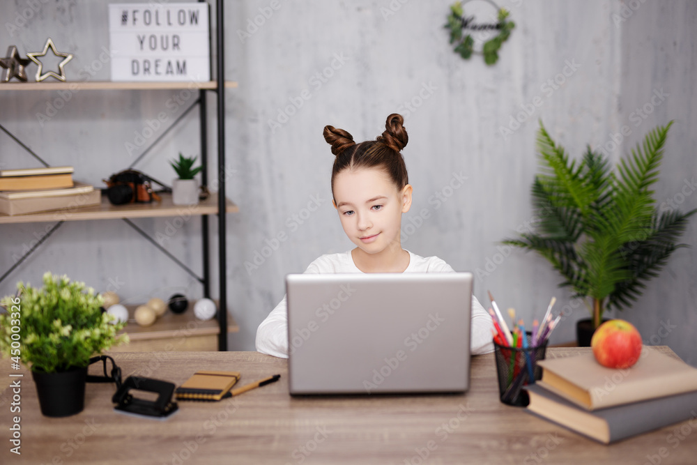 school, homework, internet and distance education concept - school girl ...