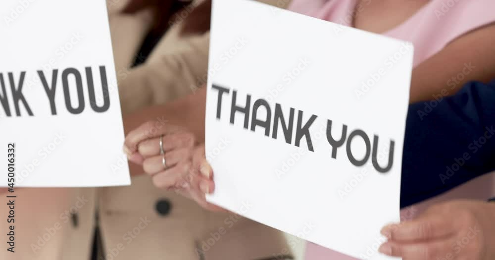 Group of people join together and hold separate thank you words for a ...