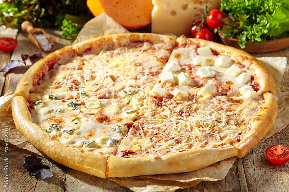 Four Cheese Pizza or Quattro Formaggi Pizza topped with tomato sauce ...