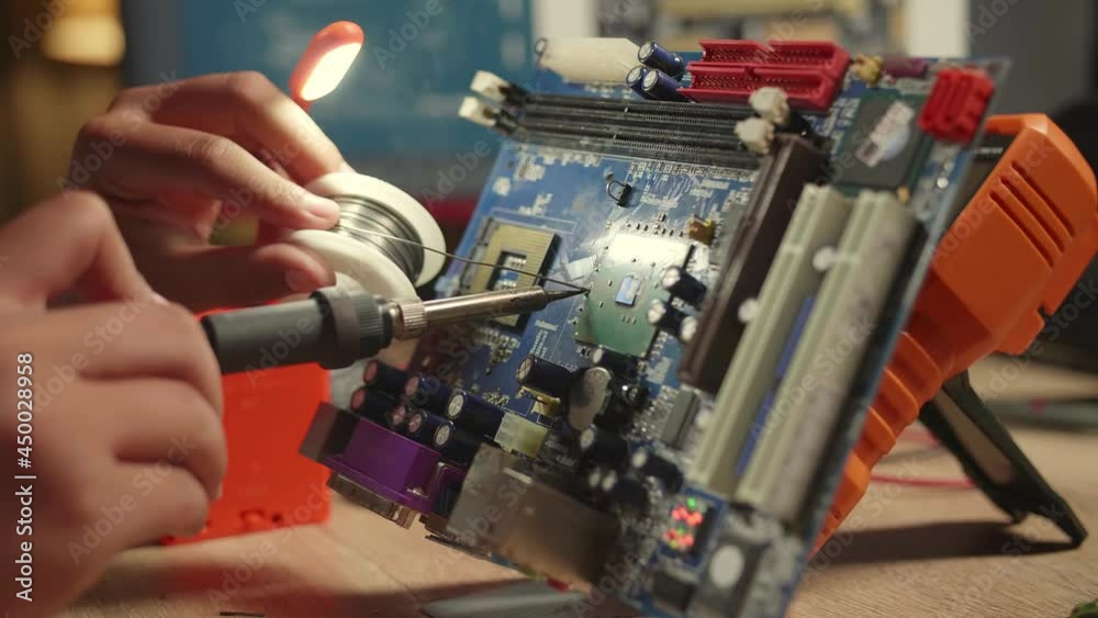 Close Up Hands'S Boy Is Soldering Electronic Circuit And Works With ...